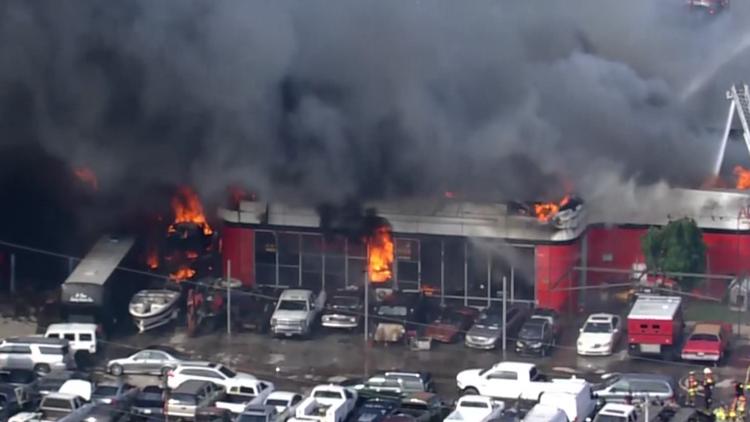 Massive fire tears through family-owned auto shop in north Houston