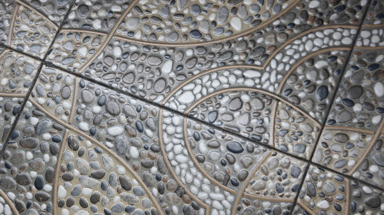 Add Depth And Texture To Your Entryway With Beach Pebble Flooring