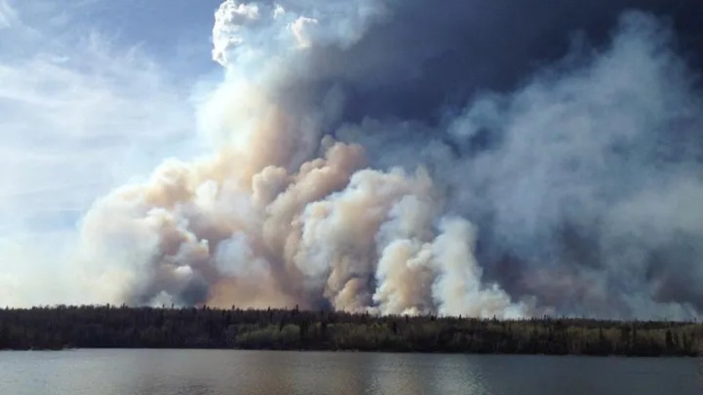Over 2 dozen Saskatchewan communities evacuated as northern wildfires rage