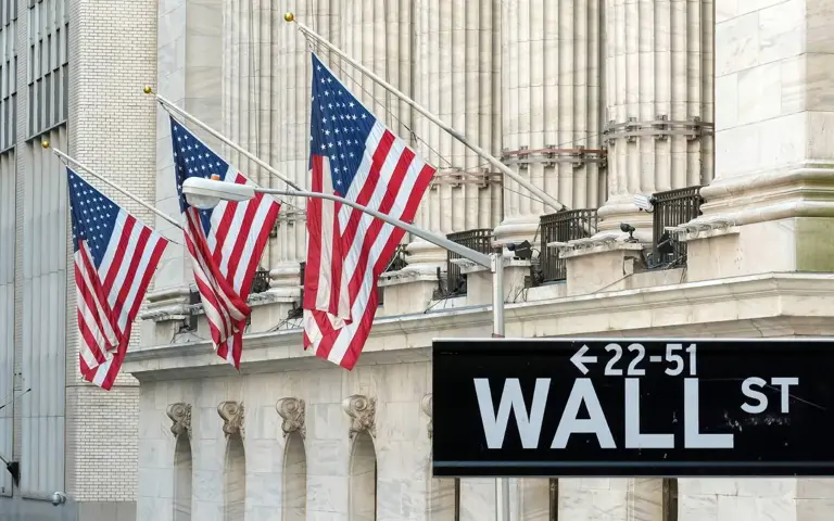 Wall Street ends lower on semiconductor selloff as AI spending concerns ...