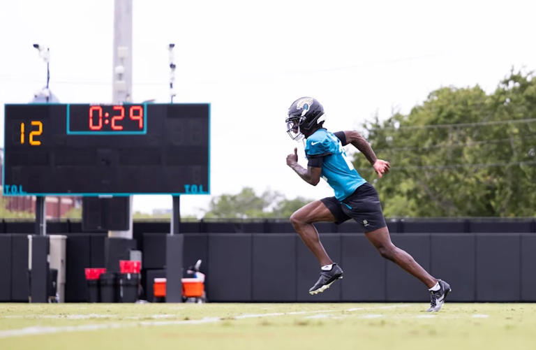 ‘Beyond the Smile:’ Travis Hunter scoring points in Duval before taking ...