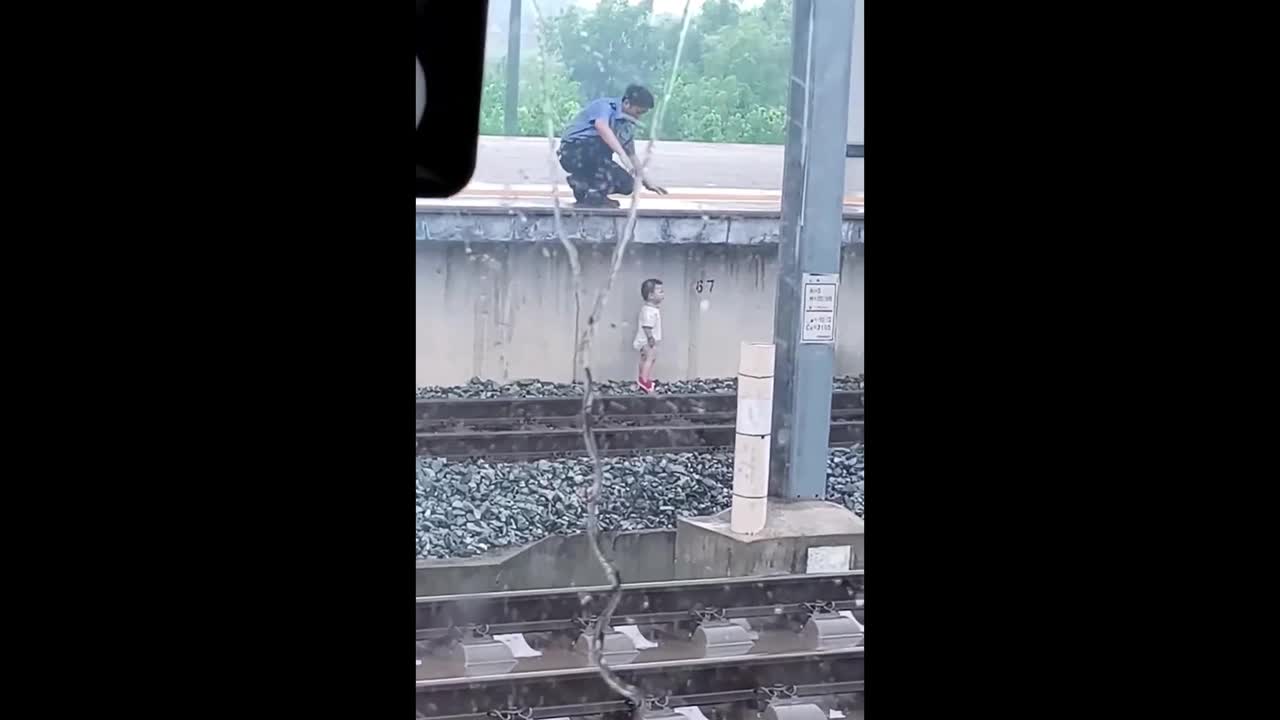 Hero railway worker rescues toddler who fell onto high-speed train ...