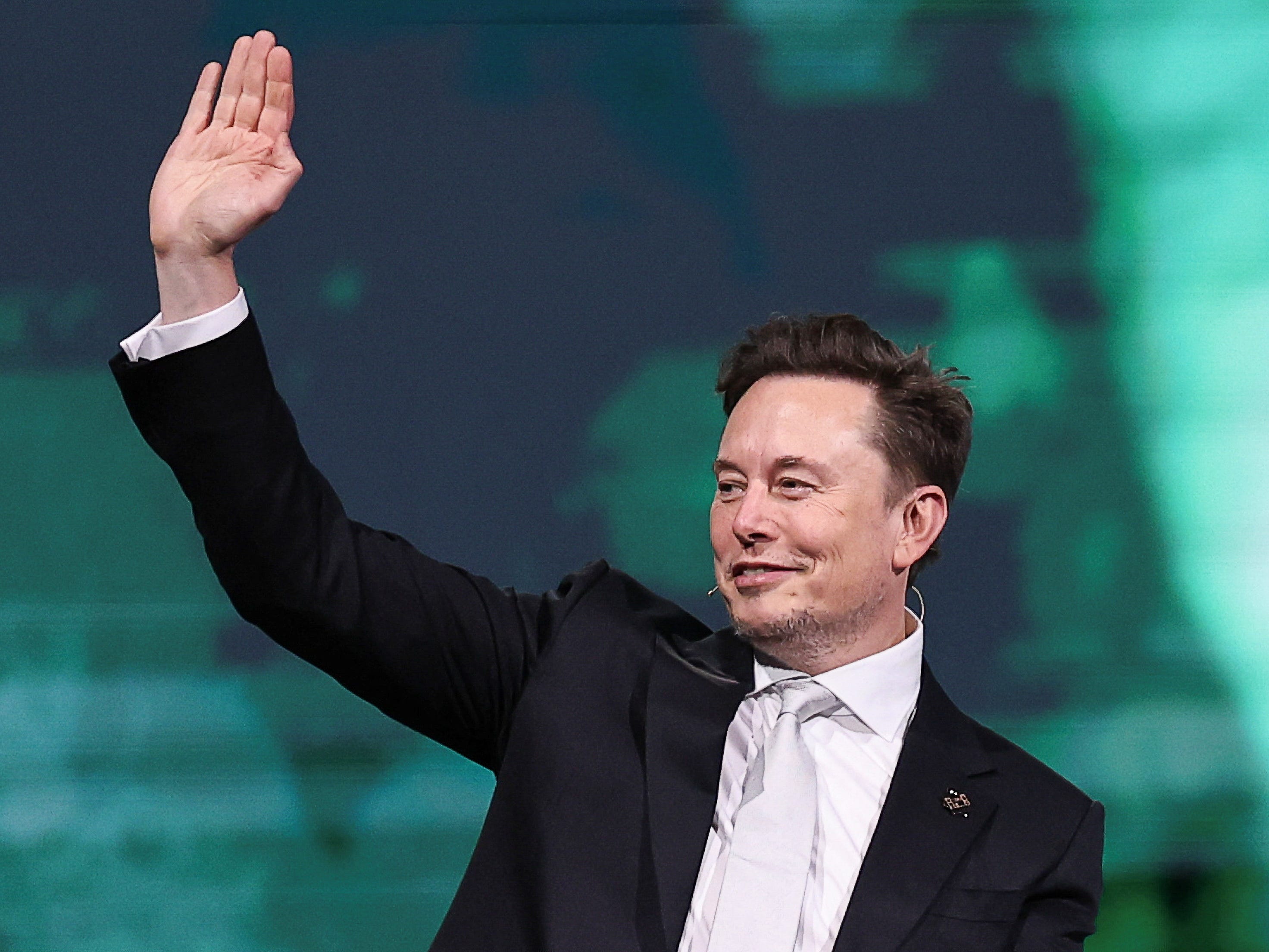 Here's what Elon Musk said about Tesla robotaxi and Optimus during his ...