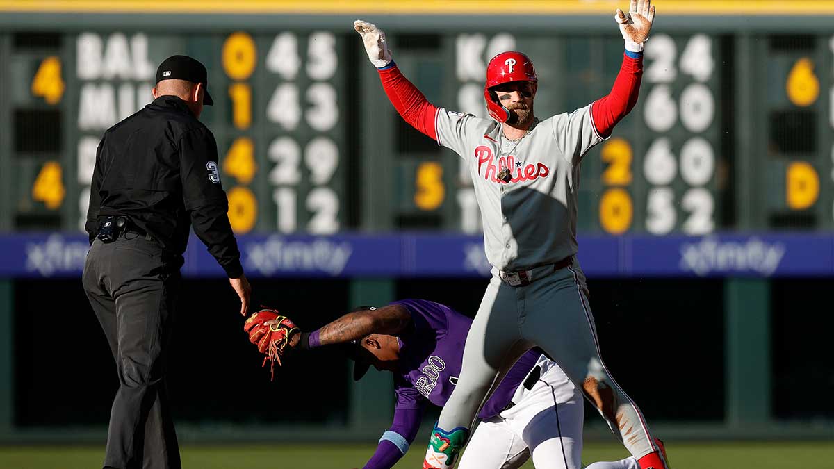Bats jump all over Rockies, Luzardo finds second wind in Phillies' 5th ...