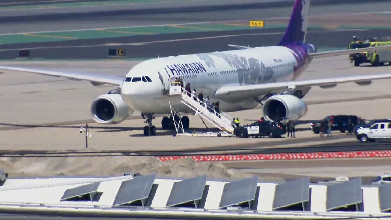 US military member arrested after false bomb threat causes flight ...