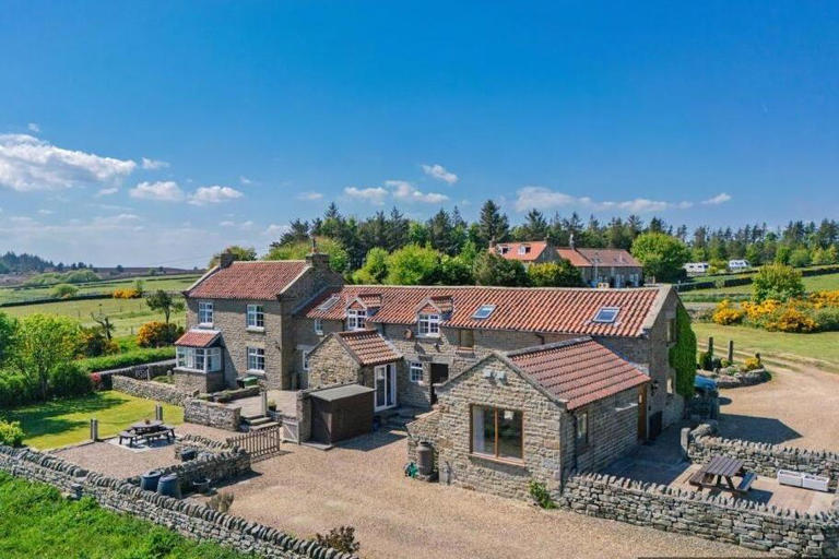 Inside detached Ravenscar home with light, space and fantastic sea views
