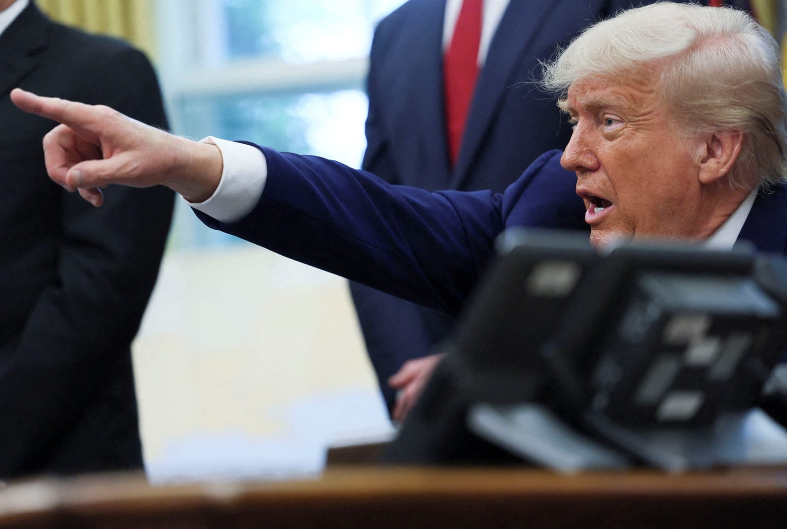 'Slink away like a coward': Academics slammed for abandoning Trump's ...