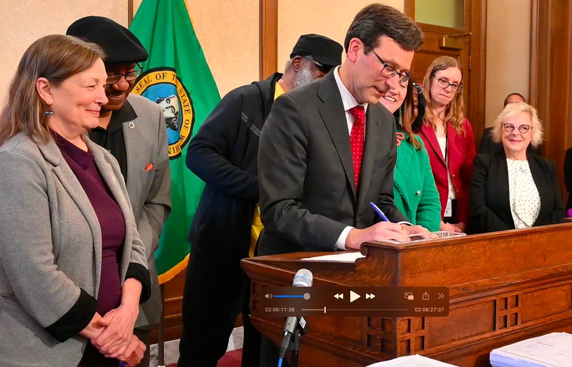 Gov. Bob Ferguson signs into law a state operating budget with more taxes