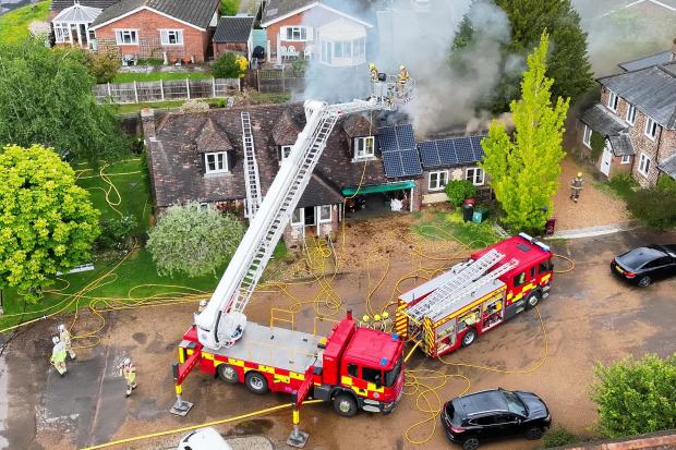 Photographs show aftermath of lightning strike on house