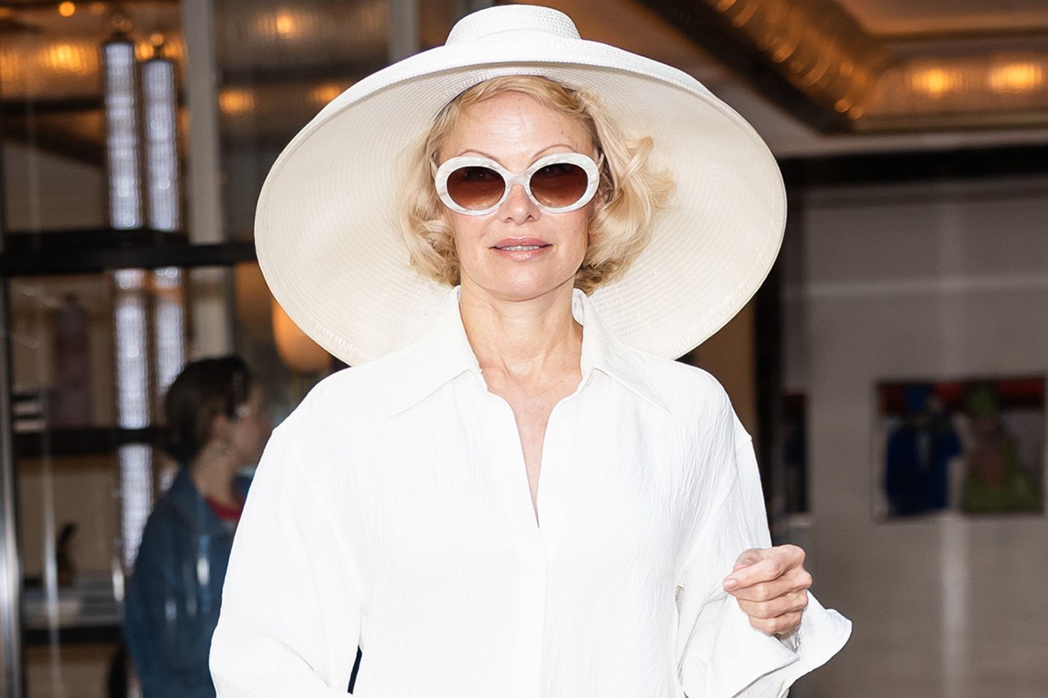 Pamela Anderson Embraces Spring Fashion with Chic All-White Look and Glamorous Accessories