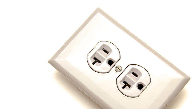 Why Do Some Electrical Outlets Have A T-Shaped Hole?