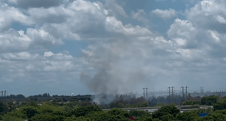 Smoke seen from road as wildfire burns in Southwest Miami-Dade