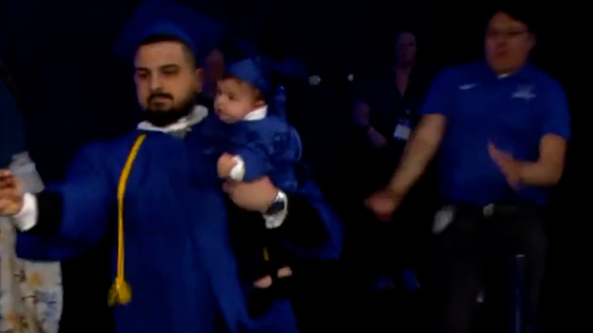 UB grad goes viral after carrying infant son on stage, breaking ...
