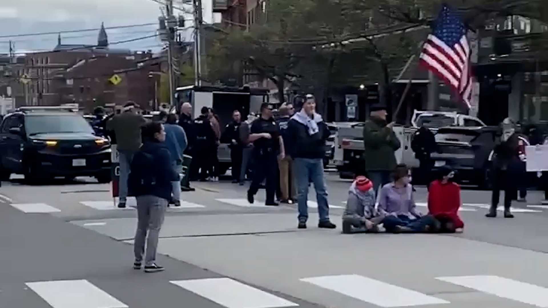 Portland police arrest nearly 20 protesters for blocking street