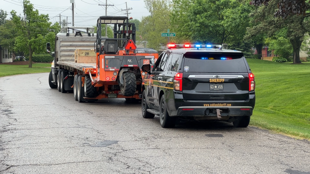 Barricades, signs installed to curb cut-through traffic on street in ...