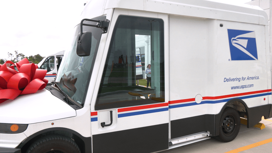 U.S. Postal Service unveils new delivery vehicles and upgraded facility
