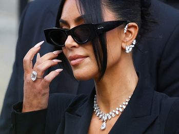 Kim Kardashian dons a graduation cap and marches closer to becoming a ...