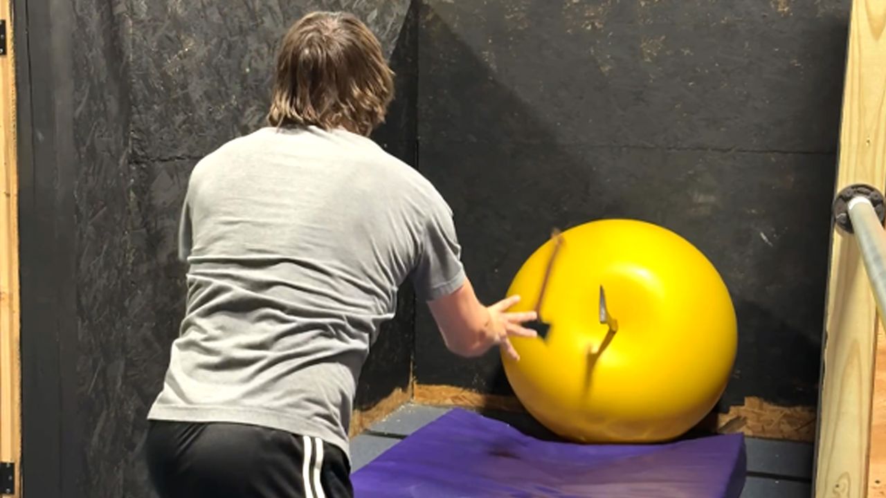 Man tries to pop exercise ball with axe, gets nasty surprise instead