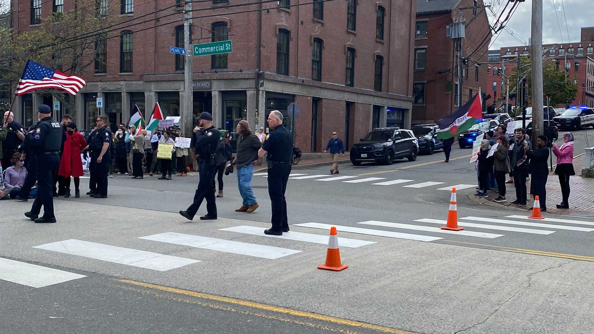 Portland police arrest nearly 20 protesters for blocking Commercial Street