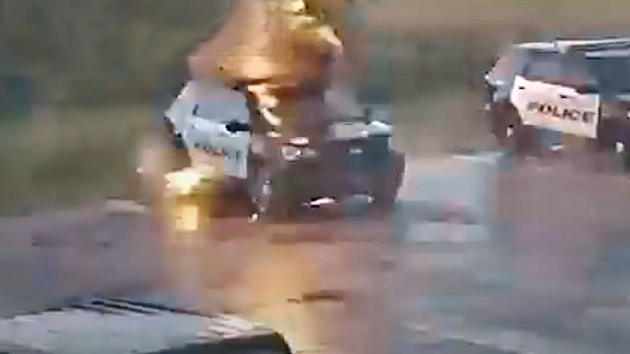 Thunderstruck! Moment lightning strikes cop car during storm in Australia
