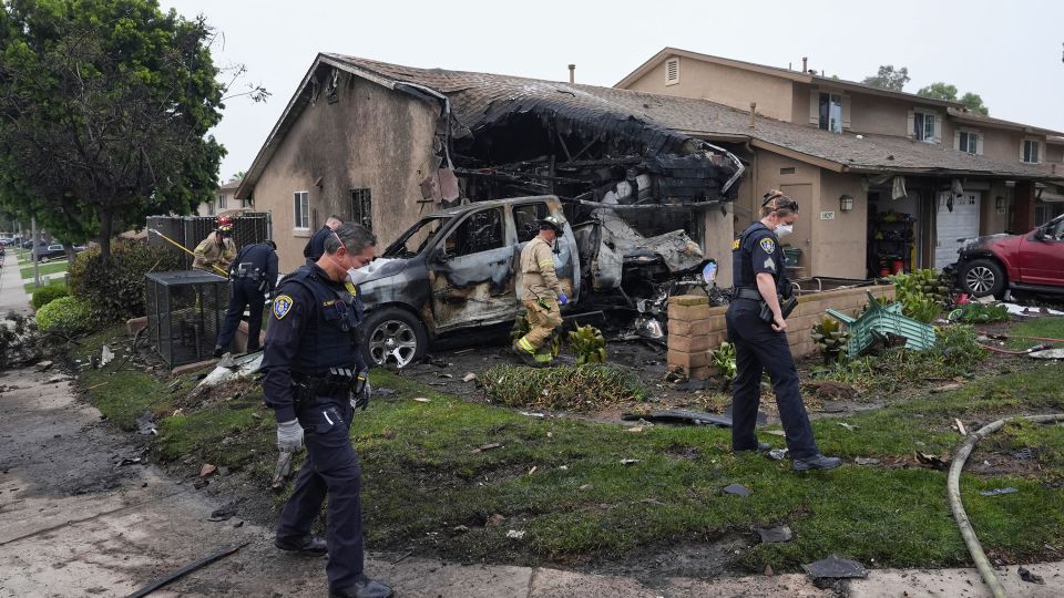 Business jet with 6 on board hit power lines before fatal crash in San ...