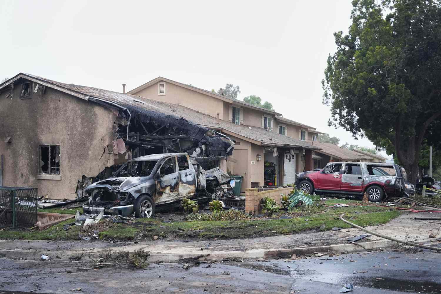 Small Plane Crashes Into Neighborhood Igniting Fires In 15 Homes And