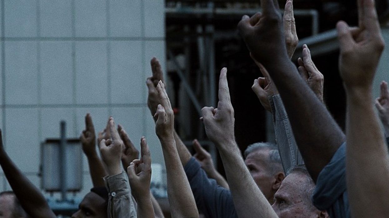 'The Hunger Games': Why Characters Use A 3-Finger Salute (& What It Means)