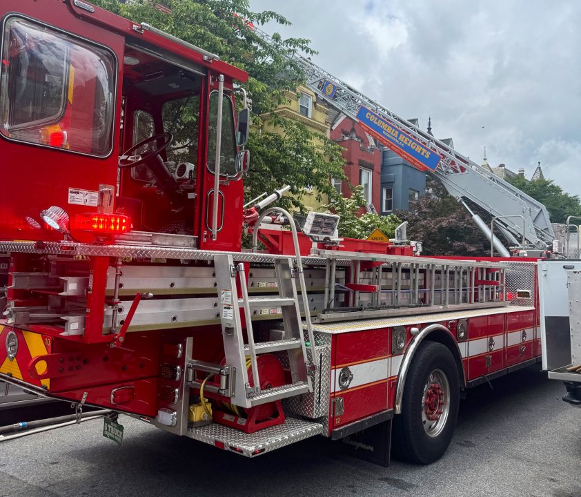 Crews respond to DC row house fire