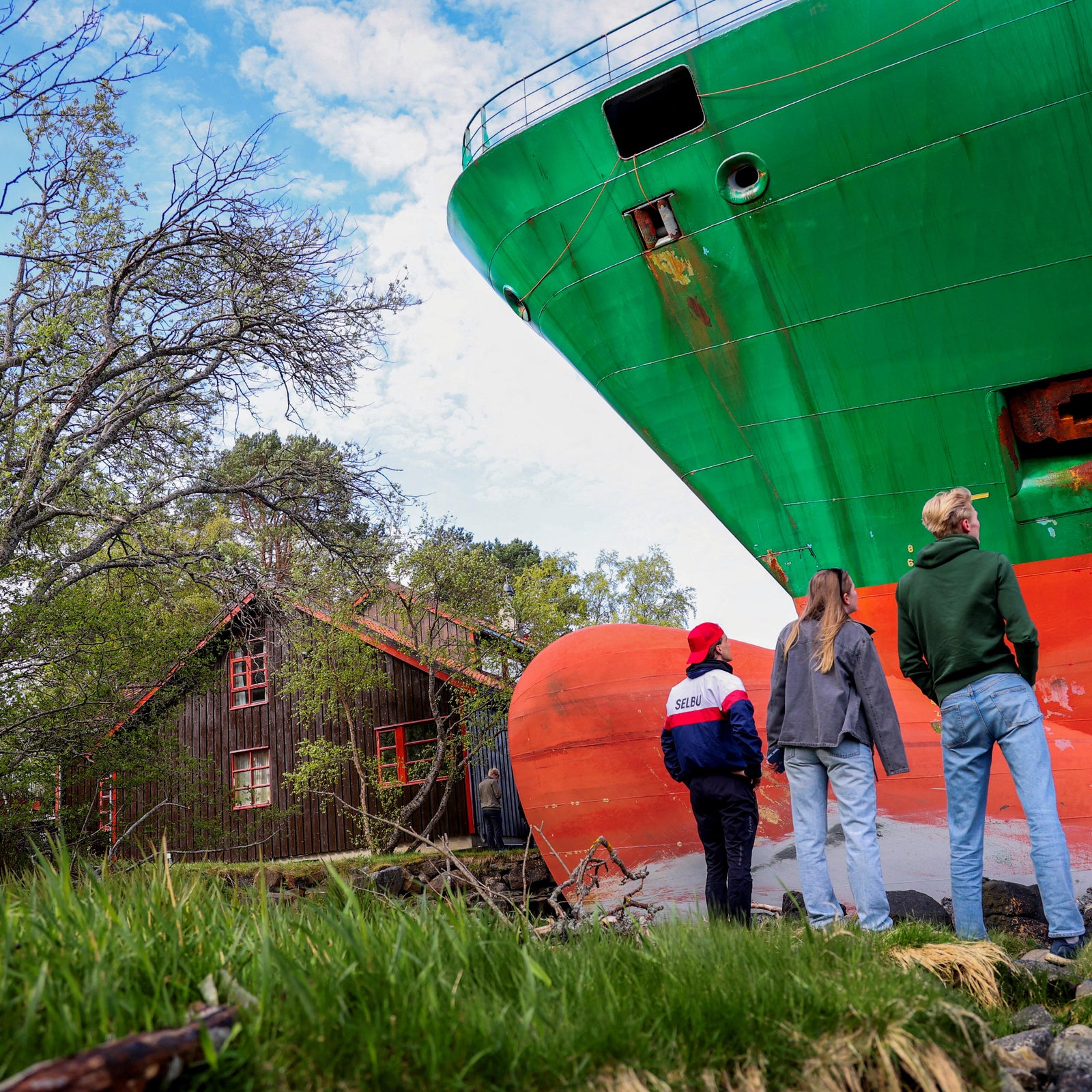 Cabin owner wakes up to find 440-foot cargo ship on his doorstep