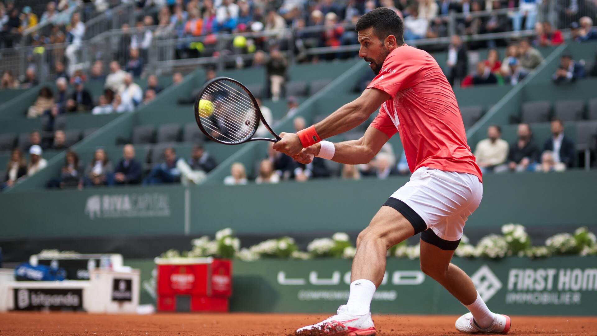 Djokovic celebrates 38th birthday with win over Arnaldi and smashed ...