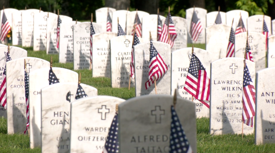 Volunteers place thousands of American flags in front of veteran ...