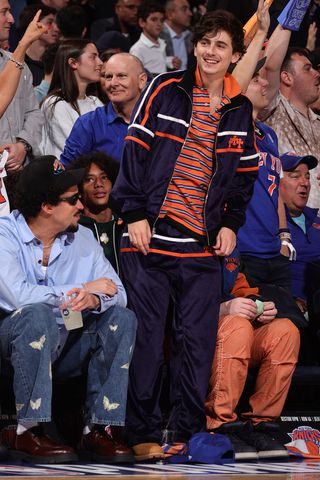 Timothée Chalamet Shows Off His Knicks Pride Courtside in Blue and ...