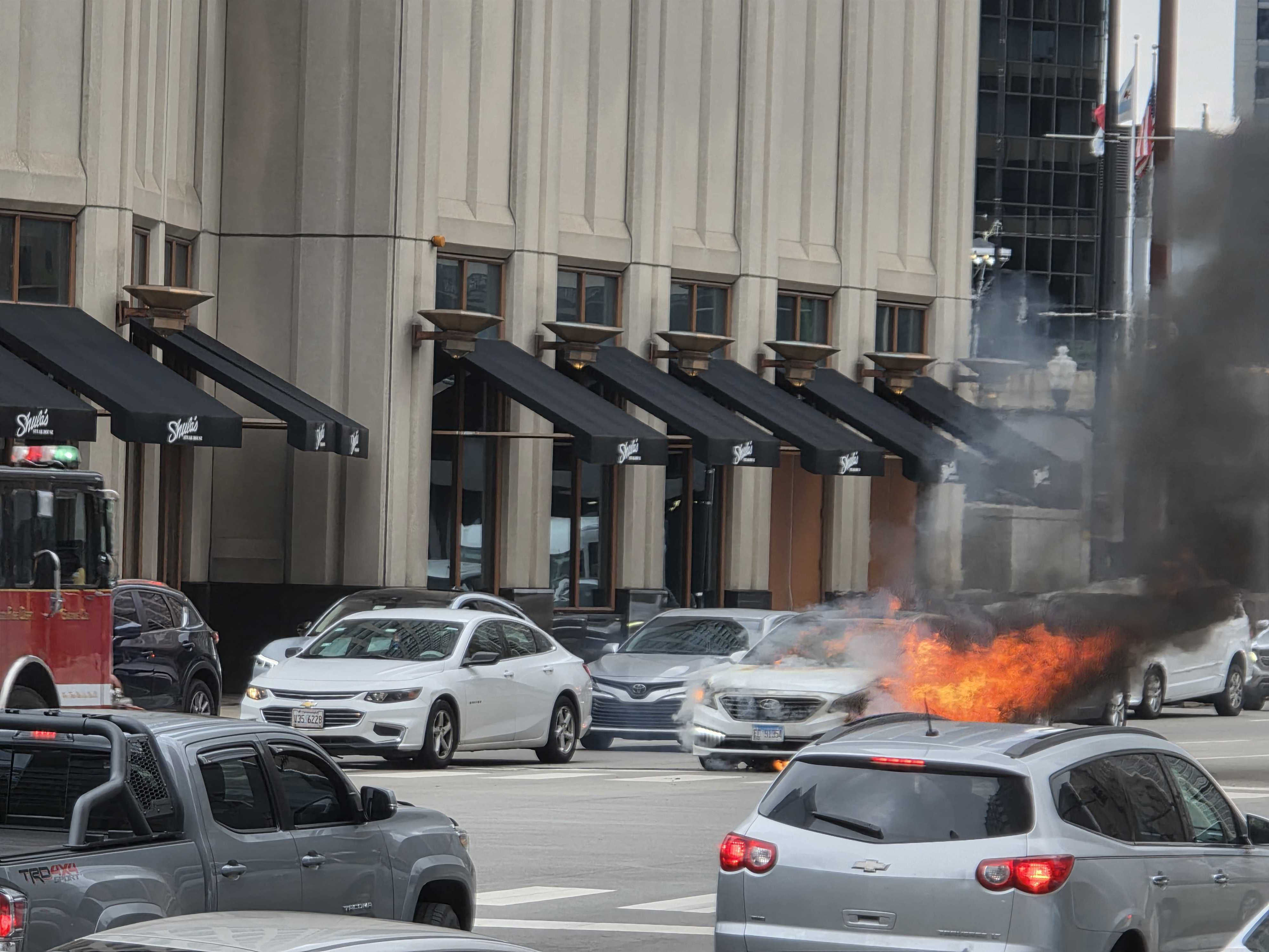 Video shows car burst into flames in downtown Chicago