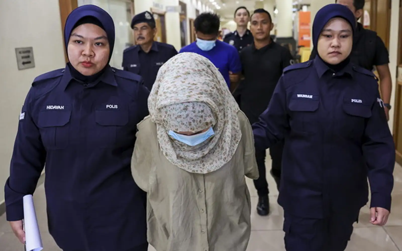 Housewife, friend charged with armed gang robbery in Pahang