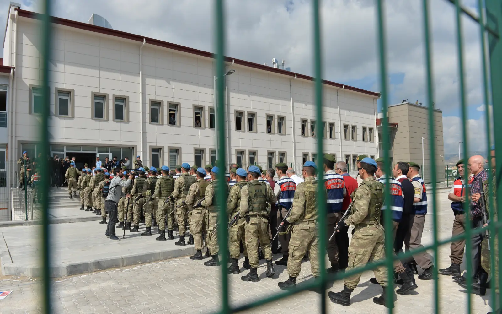 Turkey arrests 65 soldiers, police for ties to late Erdogan foe