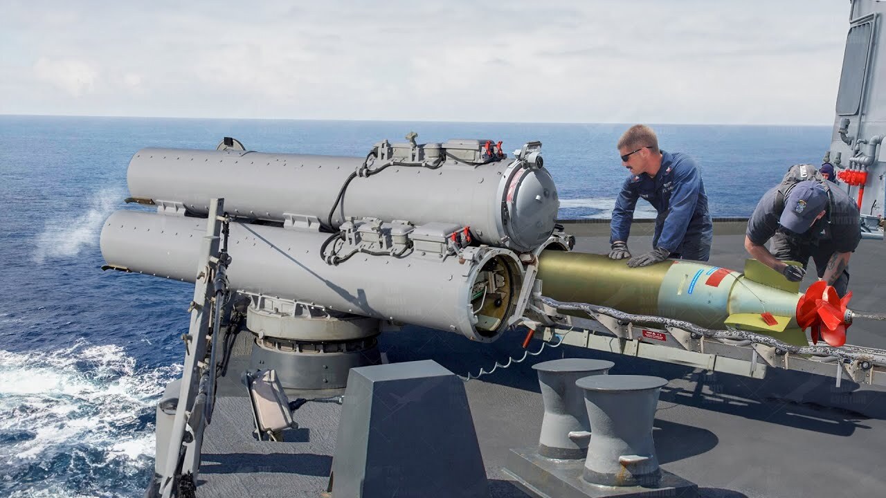 US Navy sailors prepare million-dollar torpedo for ship target practice