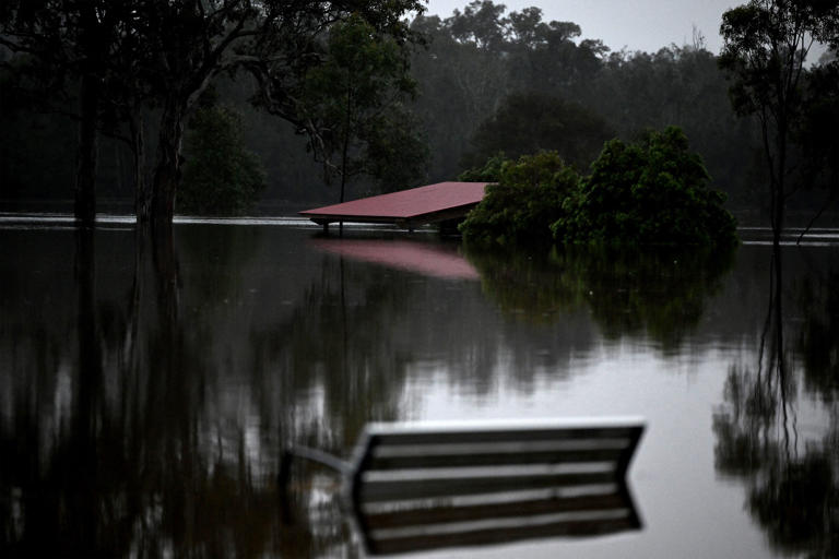 In photos: Deadly floods strand over 50,000 people in eastern Australia