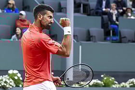 Djokovic celebrates 38th birthday with win over Arnaldi, smashed racket ...
