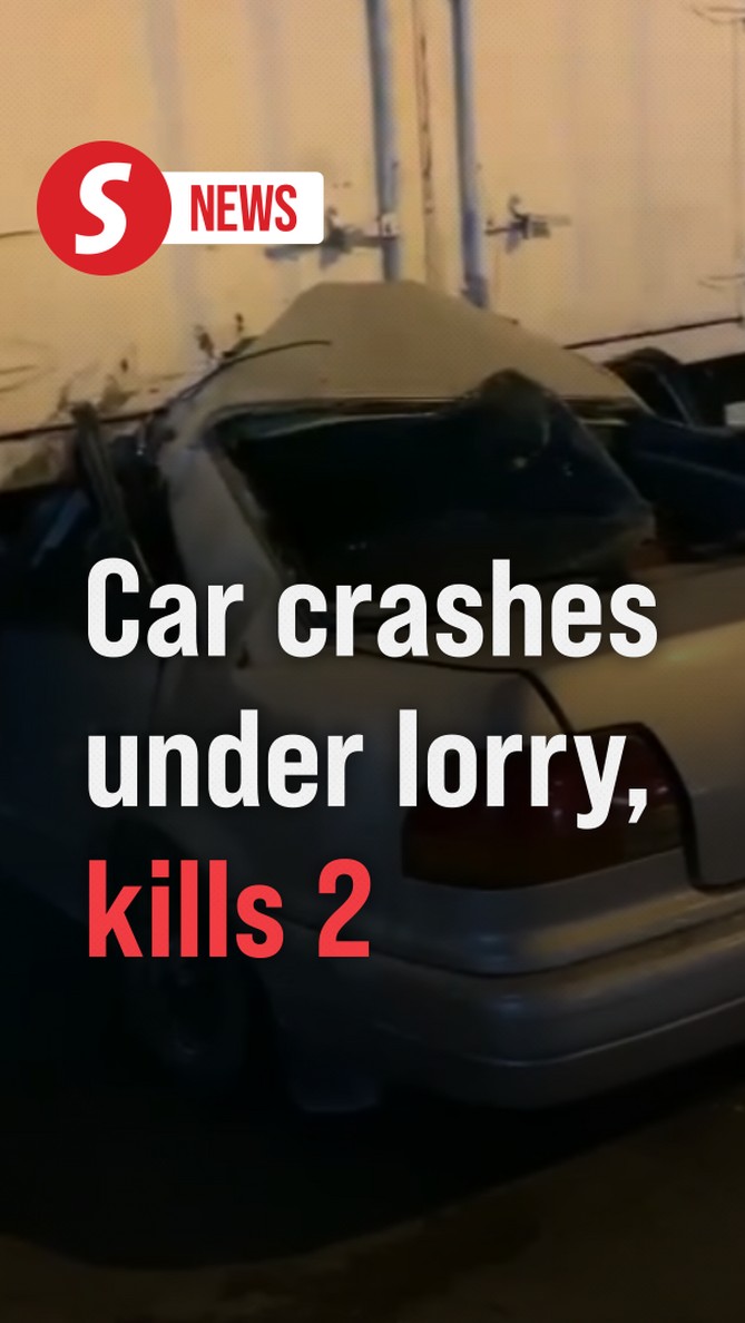 Car crashes under lorry in Melaka, kills two