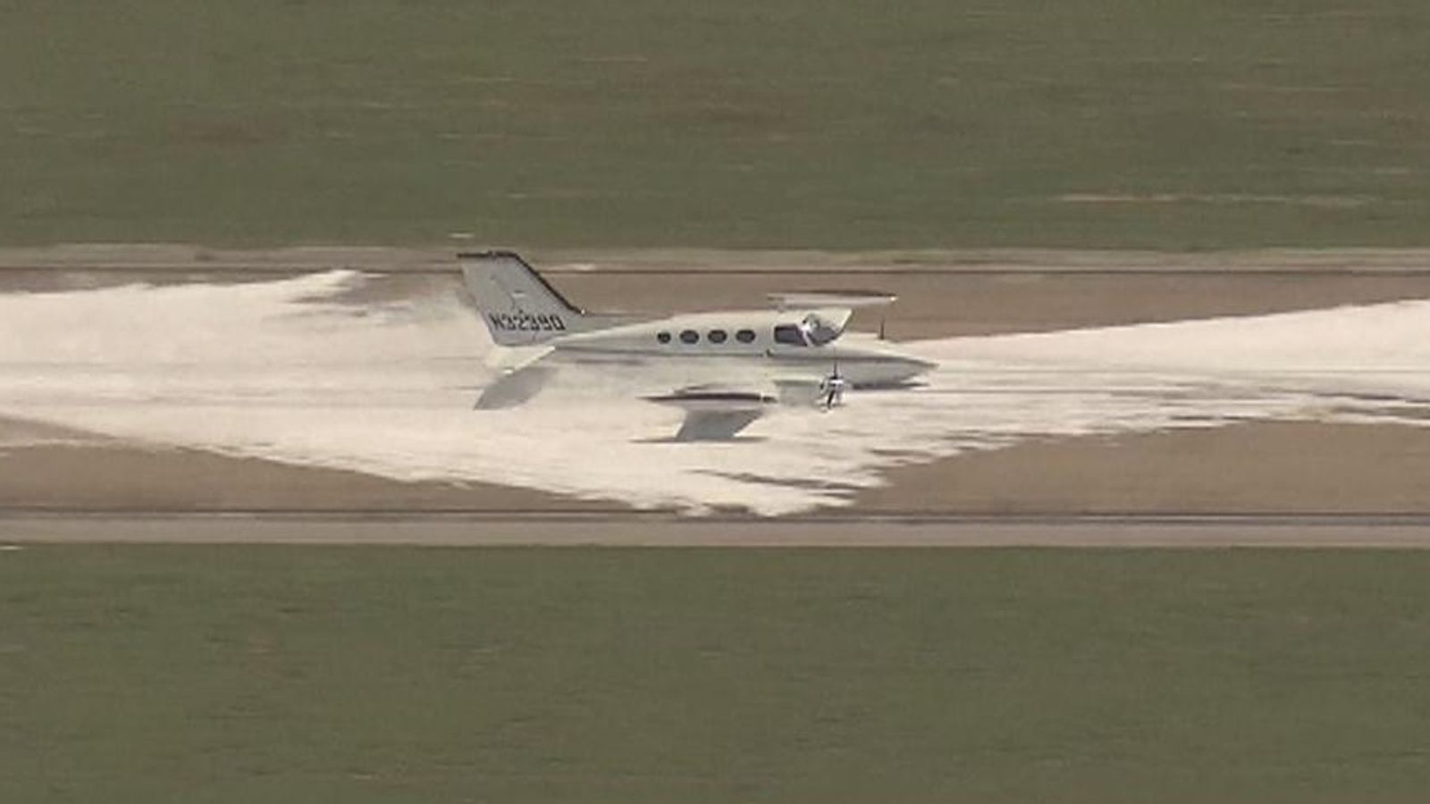 Plane lands on foam-covered runway