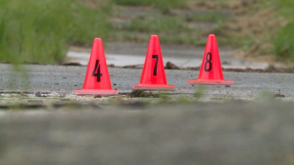Evidence markers seen on ground in Flint as police investigate shooting