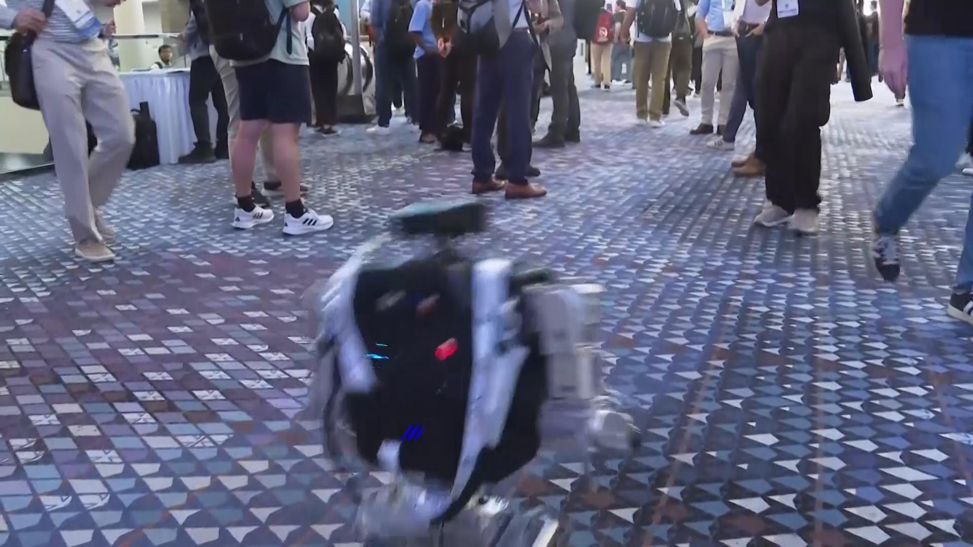 Robots walk, roll, fly to showcase cutting edge technology at leading ...