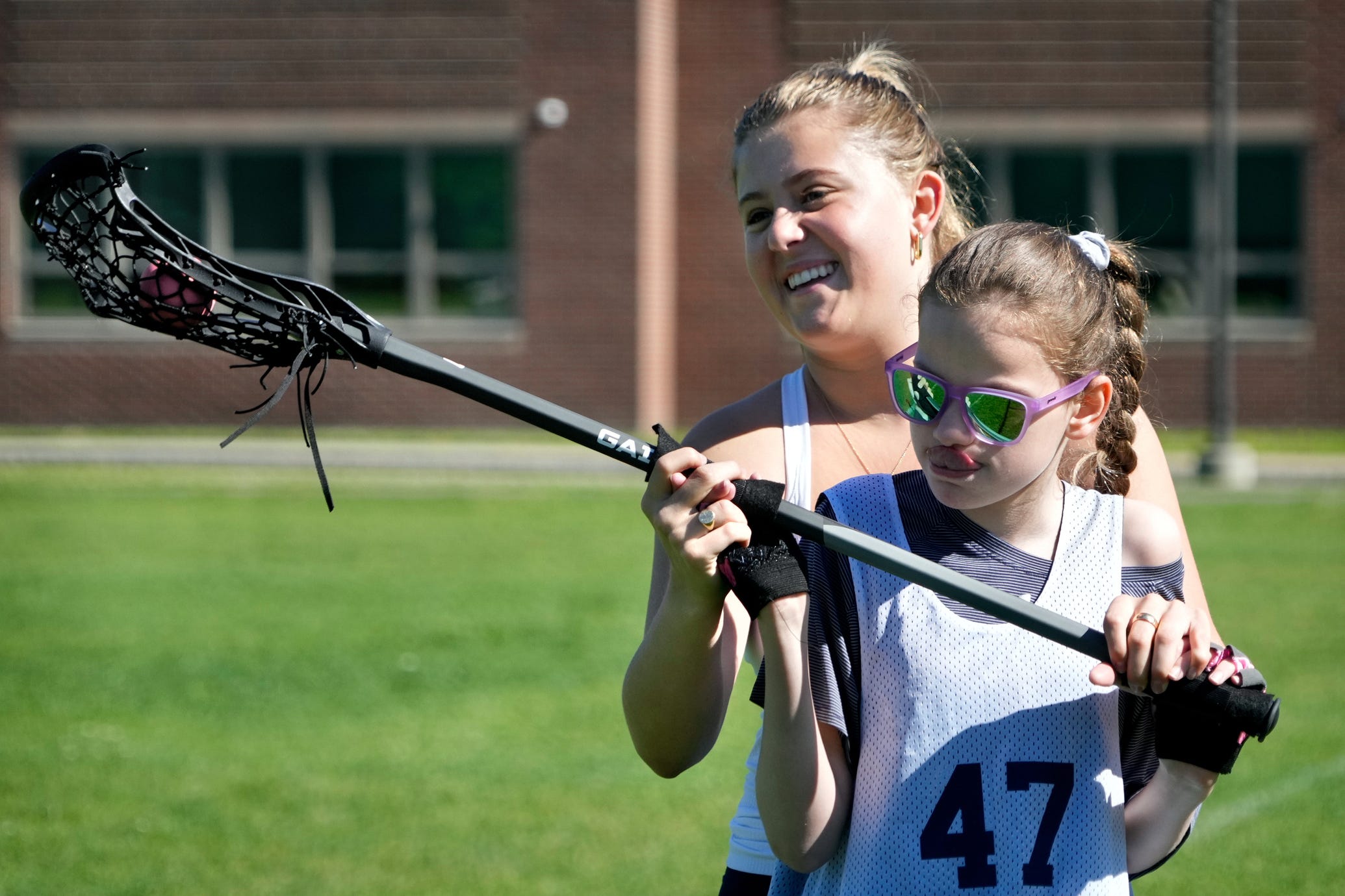 Adaptive lacrosse program teaches 20 students basics of the game in ...