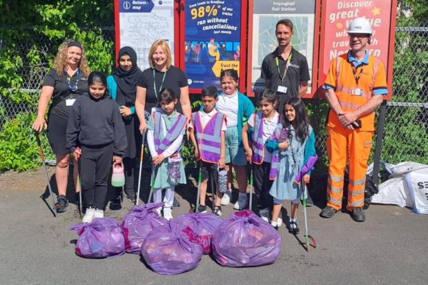 Bradford school pupils help clean up Frizinghall station