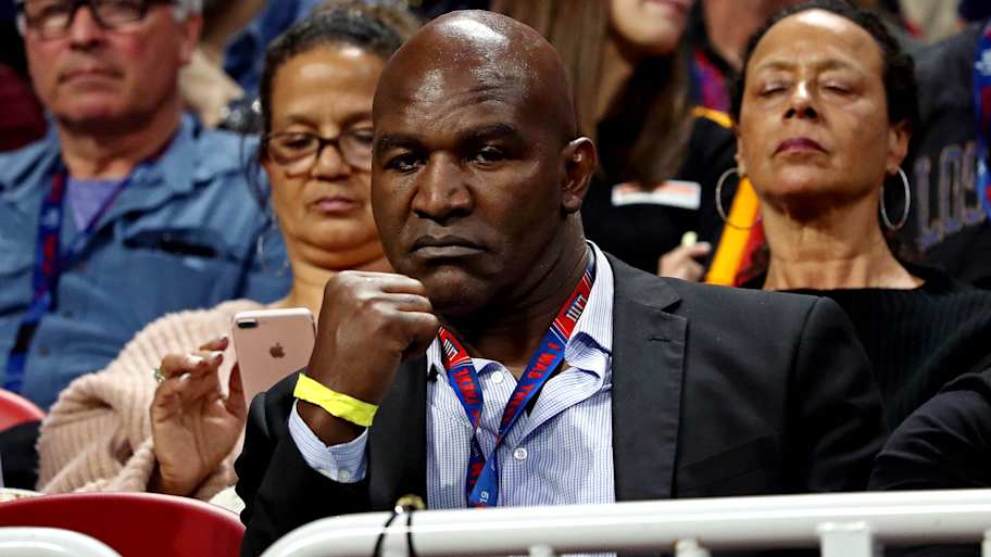 Evander Holyfield, daughter Eve poke fun at Mike Tyson ear-biting ...