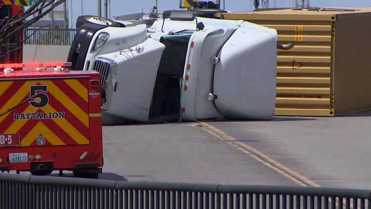 Rolled freight truck blocks ramp near West Seattle Bridge