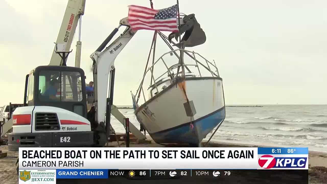 Beached sailboat in Cameron Parish on journey to set sail once again