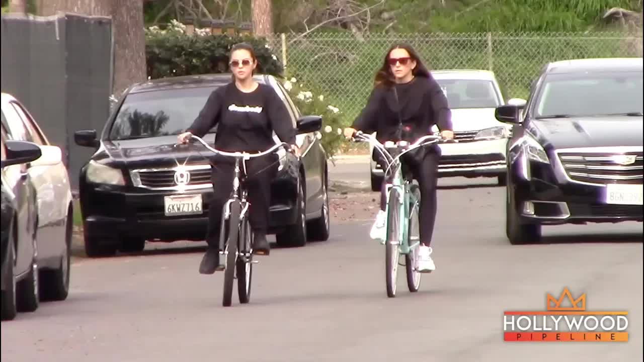Selena Gomez Takes a Bike Ride with a Friend in Los Angeles