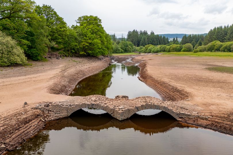 Reservoir shrinks to reveal sunken bridge flooded centuries ago
