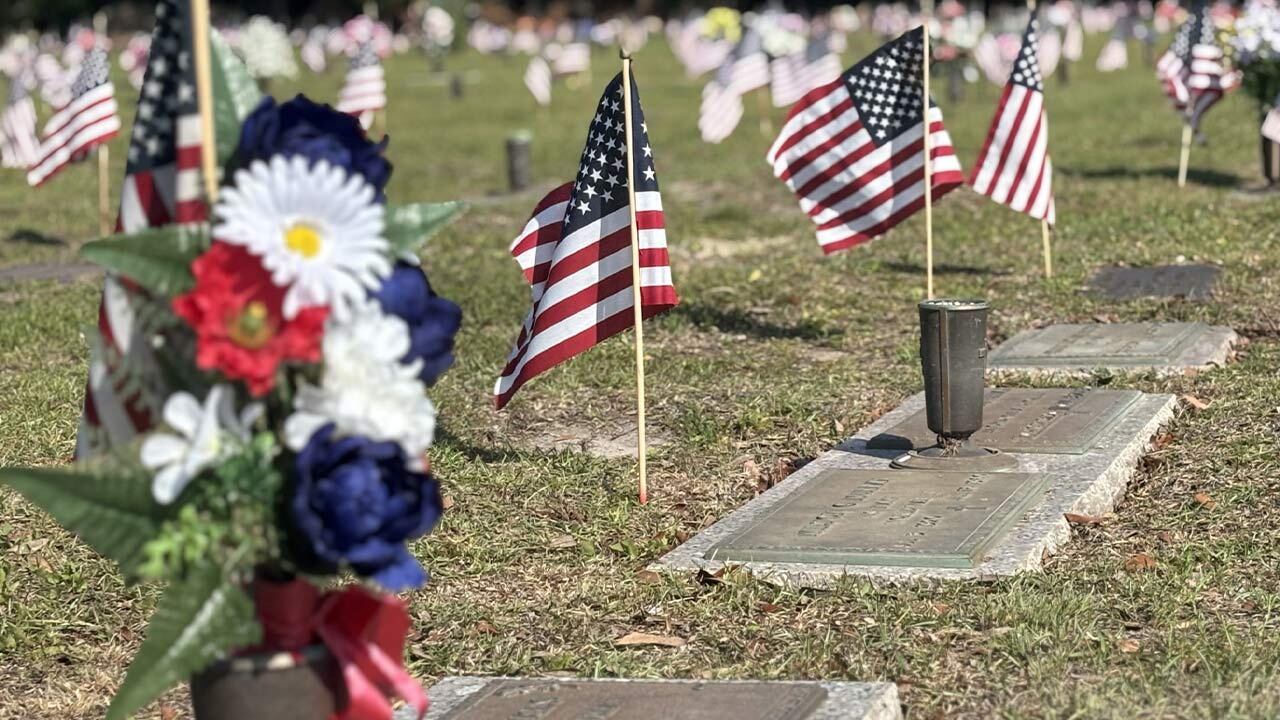 More than 400 fallen veterans honored with American flags on graves